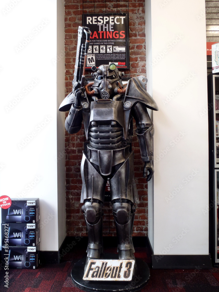 Fallout 3 Display of Person in Armor holding gun inside Gamestop Store ...