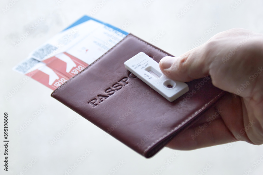 COVID-19 test cassette on passport,travel in the time of Coronavirus ...