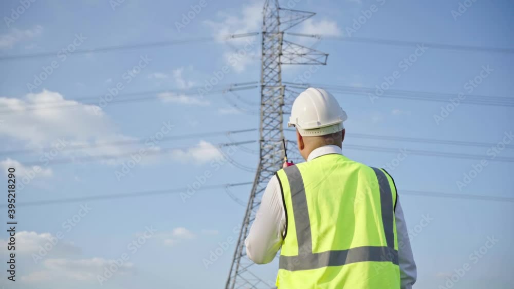 Vision of engineer. Electrical engineer working with radio walkie ...