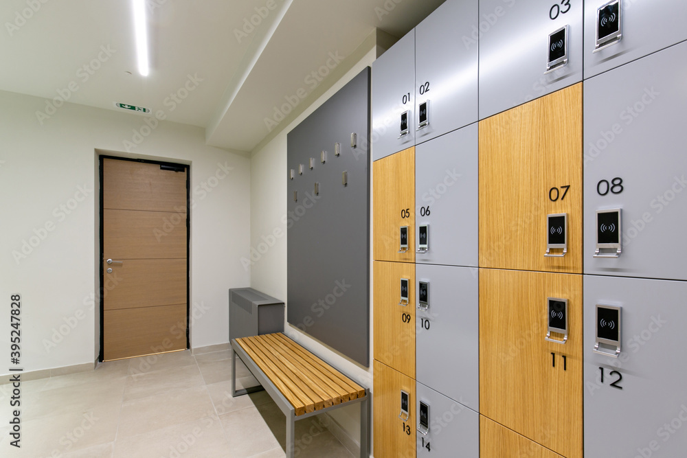Locker room interior with key card access to locker in gym fitness ...