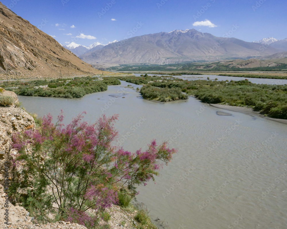 View on Panj river valley with Hindu Kush mountain range in Afghanistan ...