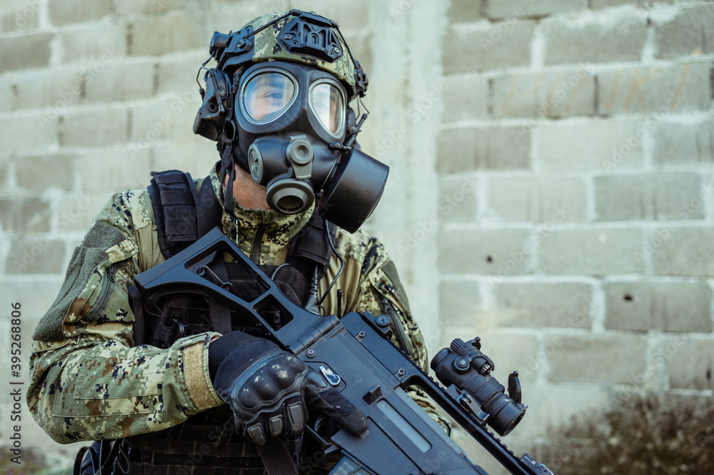 Croatian soldier in Cropat woodland uniform wearing gas mask M95 and ...