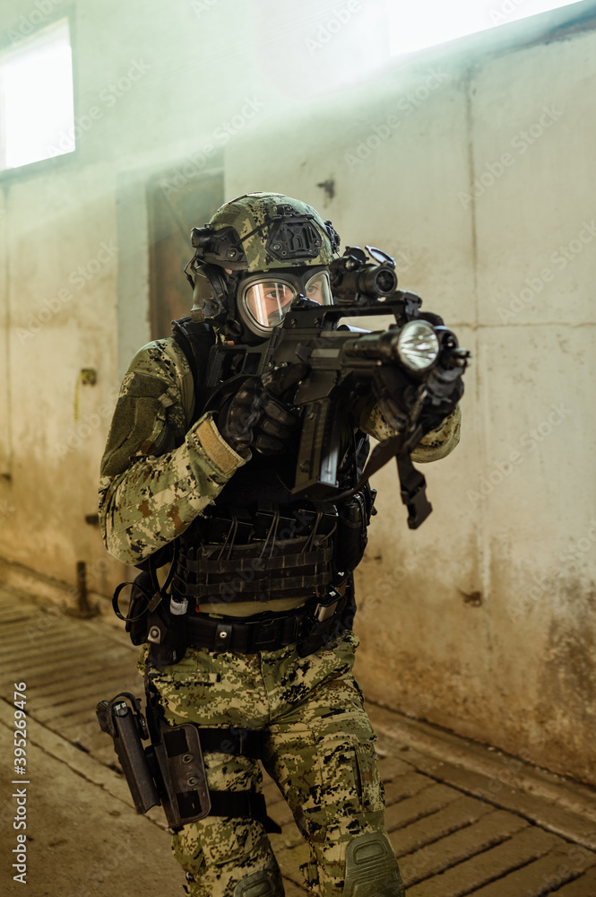 Croatian soldier in Cropat woodland uniform wearing gas mask M95 and ...