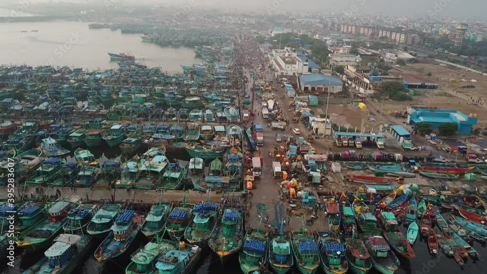 Aerial View over Fishing Boats in Royapuram fishing harbor. Fishing ... Aerial View over Fishing Boats in Royapuram fishing harbor. Fishing ...