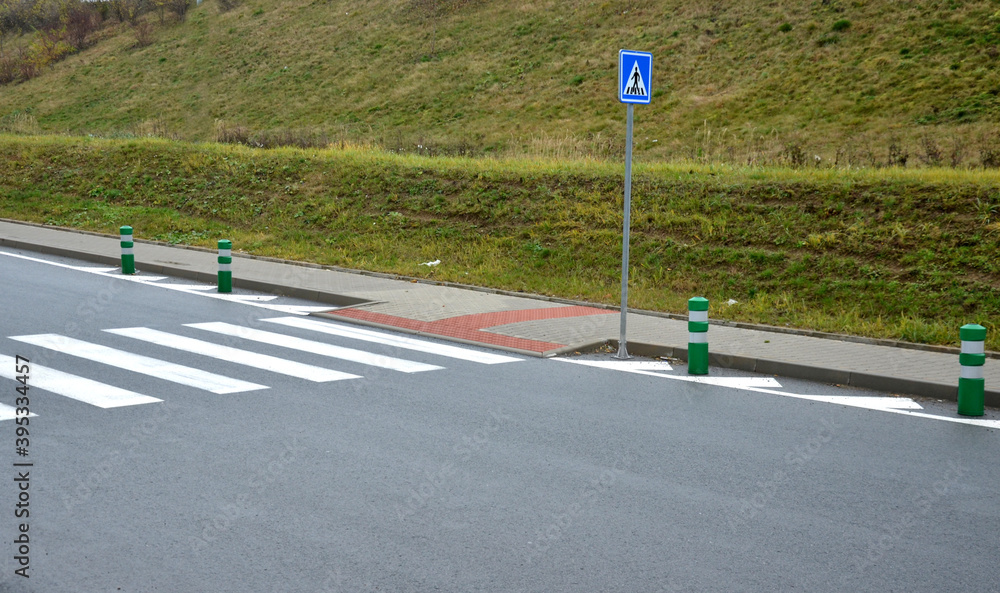 road signs drawn on the road side. zebra where he must not stop and ...