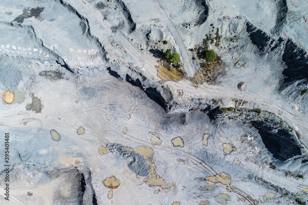 Working quarry environment seen from a drone. Amazing colorful patterns ...