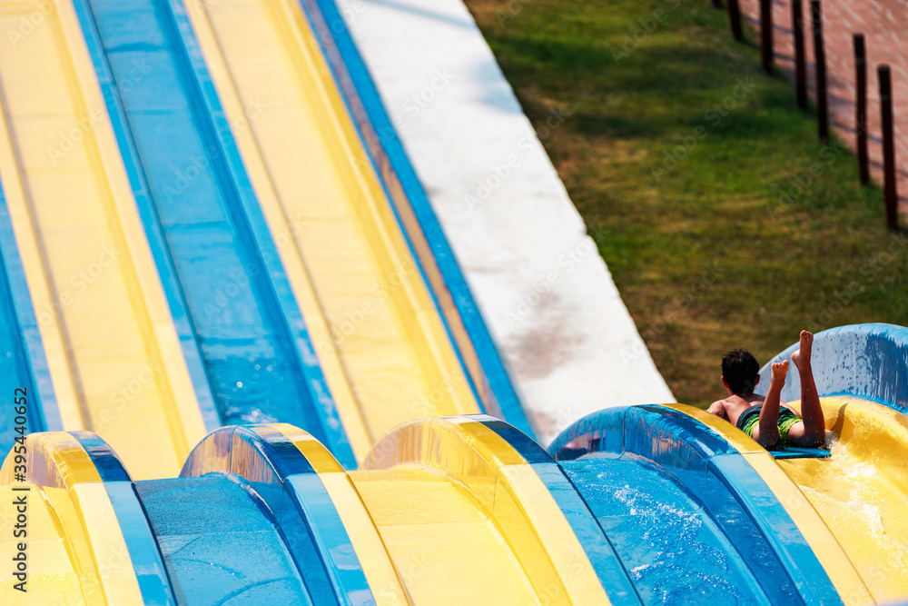 Water park adventure aqua park with cool people having fun on the water ...