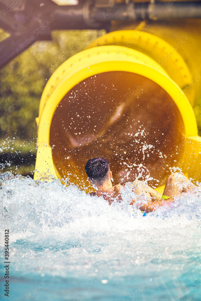 Water park adventure aqua park with cool people having fun on the water ...