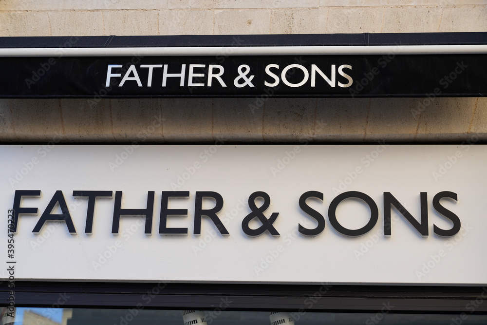 Father & Sons logo text and sign front of store clothing luxury fashion ...