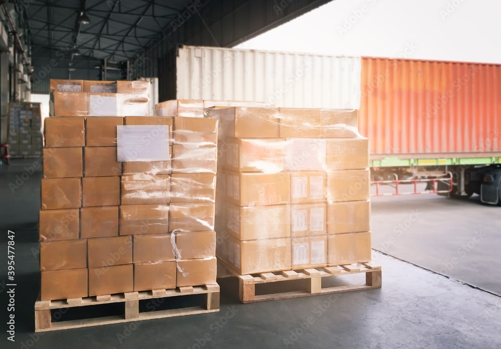 Stacked of Package Boxes Load with Cargo Container. Trailer Truck ...