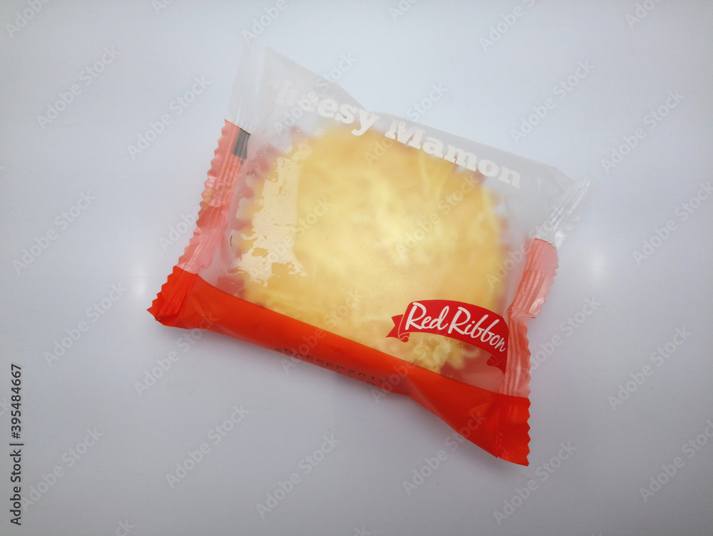 Red ribbon cheesy mamon bread in Quezon City, Philippines Stock Photo ...