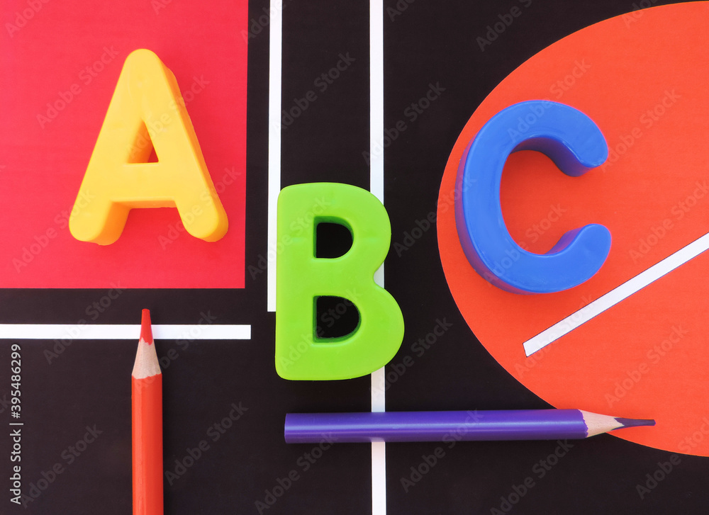 ABC letters alphabet and pncils on abstract background with geometric ...