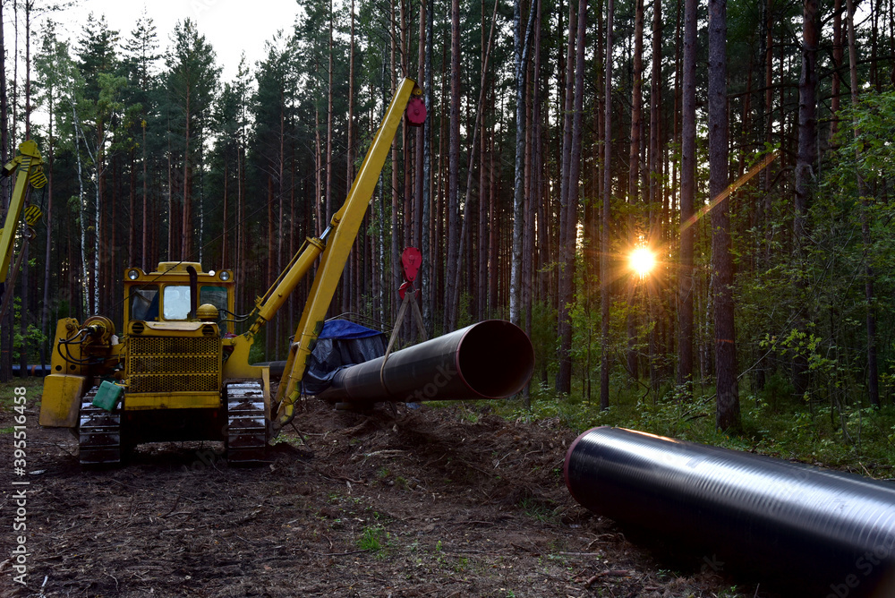 Construction natural gas pipeline project on sunset background. Crude ...