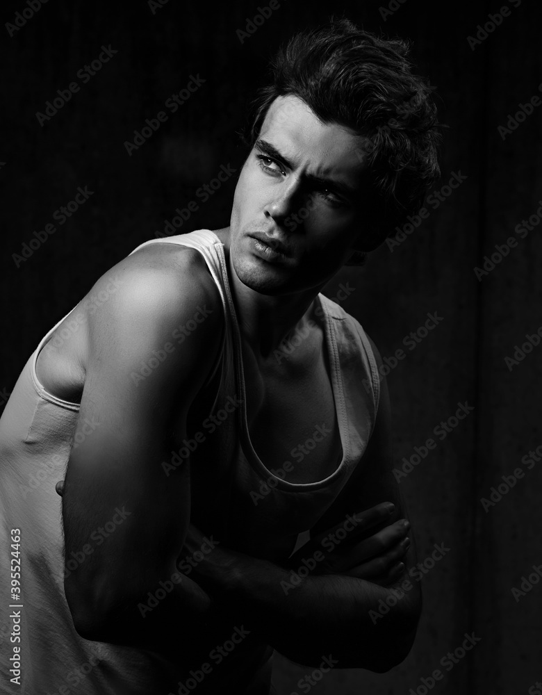 Sexy Male Model Posing In White Underwear In Dark Shadow Background