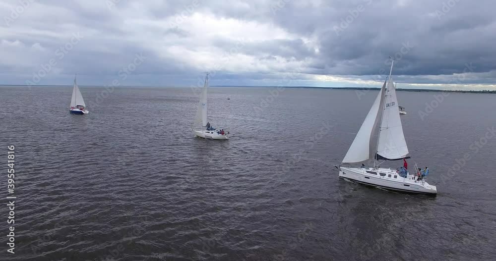 Sailing in the wind. Full sails, very strong wind. Ocean race, real ...