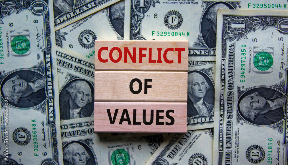 Conflict of values. Wooden blocks with words 'conflict of values ...