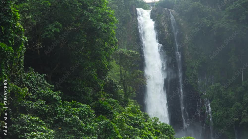 Waterfall in green forest, top view. Tropical Maria Cristina Falls in ...