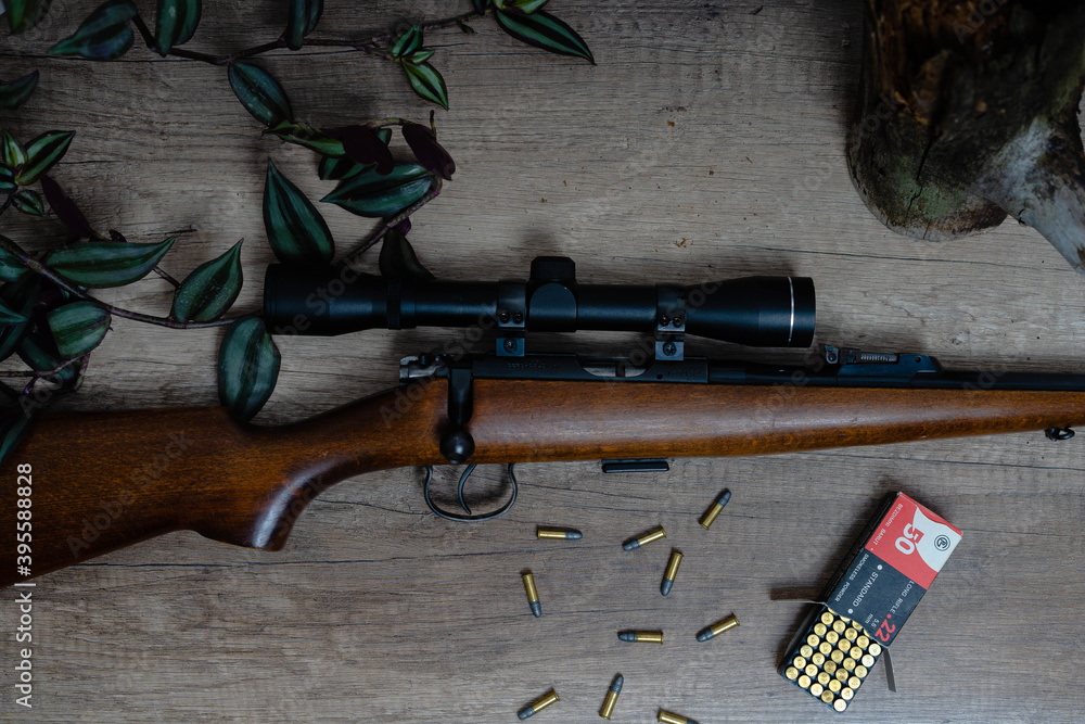 Top view of beautiful rifle with wood stock. Caliber 22 long rifle ...