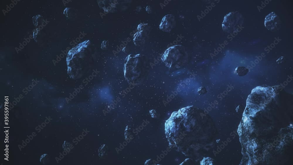 asteroids slowly fly from left to right in open space against the background of stars and ...