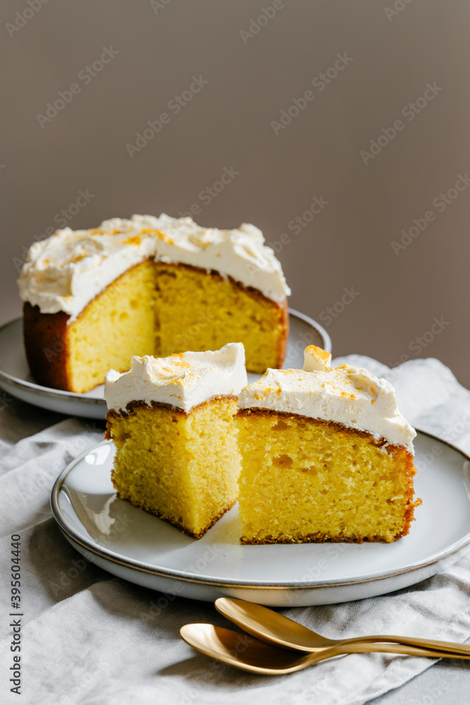 Single-layer turmeric cake with classic cream-cheese frosting Stock ...