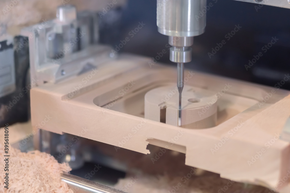 CNC engraving, woodworking, carving, industrial, manufacturing concept ...