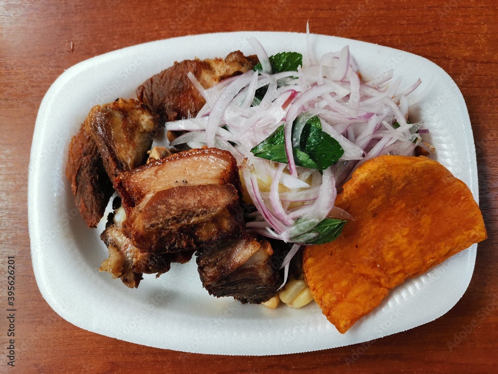 Chicharron de chancho traditional food in Perú Stock Photo | Adobe Stock