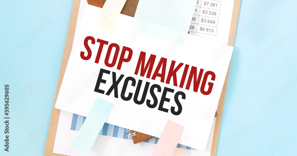 Paper plate with text STOP MAKING EXCUSES. Diagram, notepad and blue ...