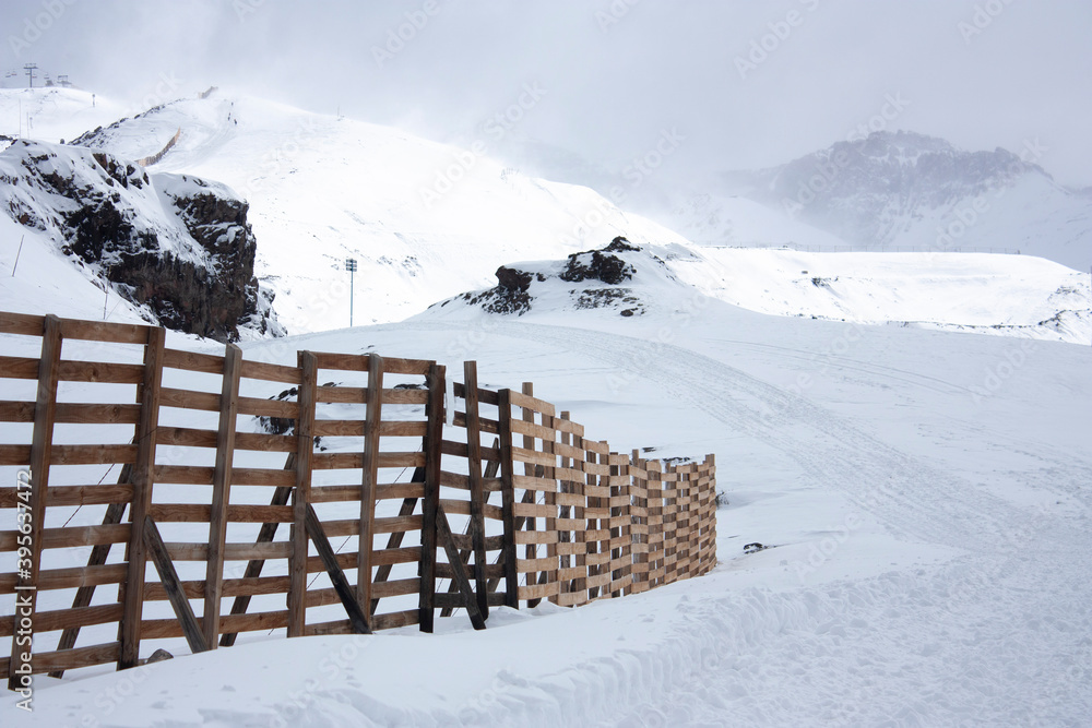Foto de Among fog the mountain chain of the Andes is shown in Snow ...