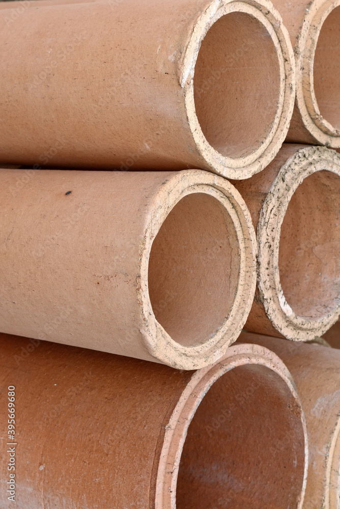 Warehouse. chamotte pipes for chimneys. modular chimney, close-up Stock ...