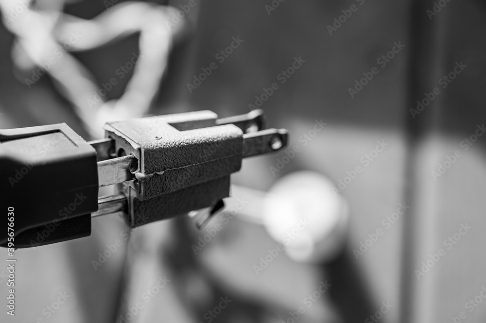 Demonstrating using a 3-prong adapter to connect two power cords Stock ...