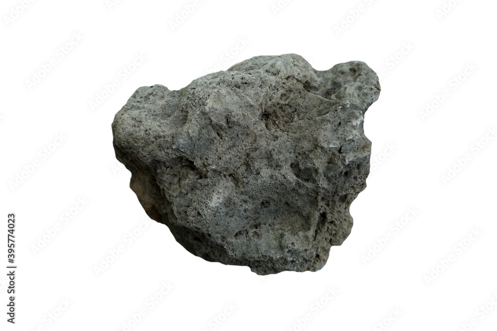 Foto de Basalt stone isolated on white background. Basalt is a dark ...