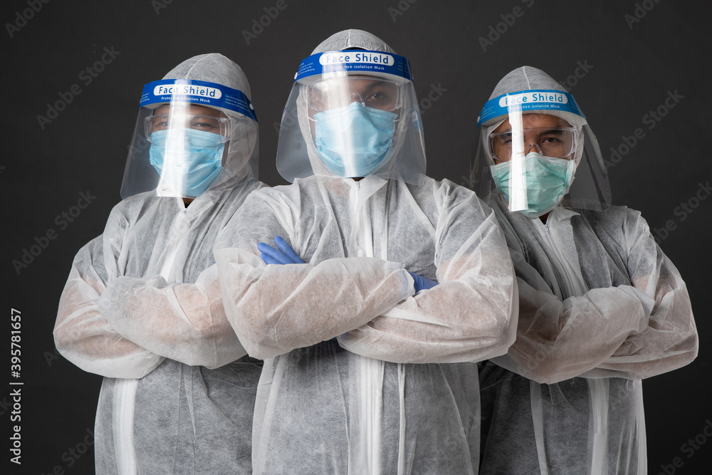 three asian male wearing Personal protective equipment in gray ...