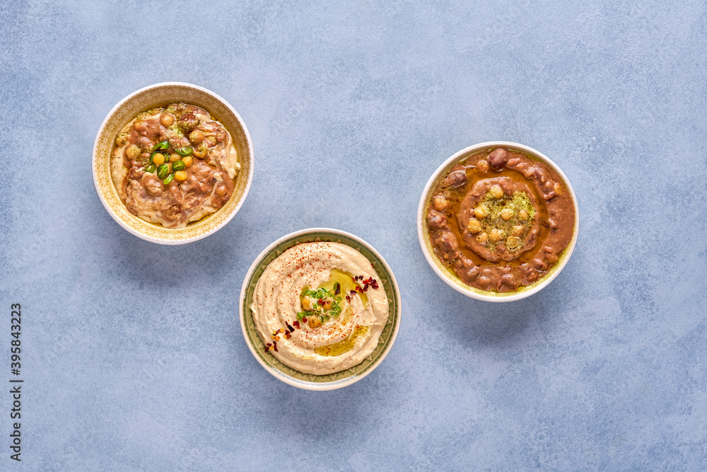 Middle eastern, arabic traditional chickpea dishes hummus, foul, and ...