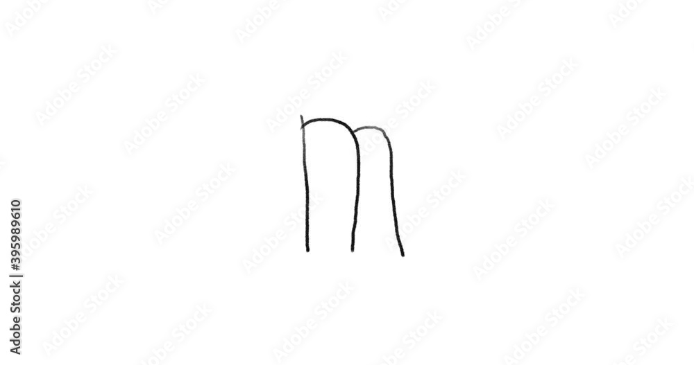 Child writes letter M of the English alphabet using a graphics tablet ...