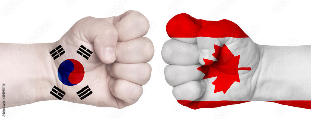 Two hands are clenched into fists and are located opposite each other ...