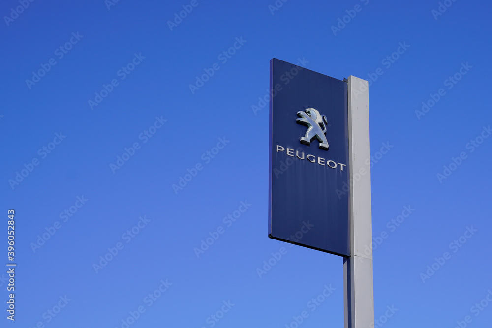 Peugeot dealership sign and text logo car shop of French automobile ...