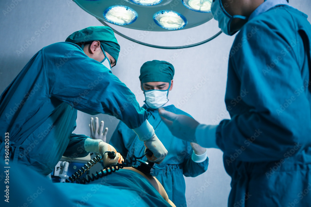 Surgical team or doctor and staff have vivisection in surgery room of ...