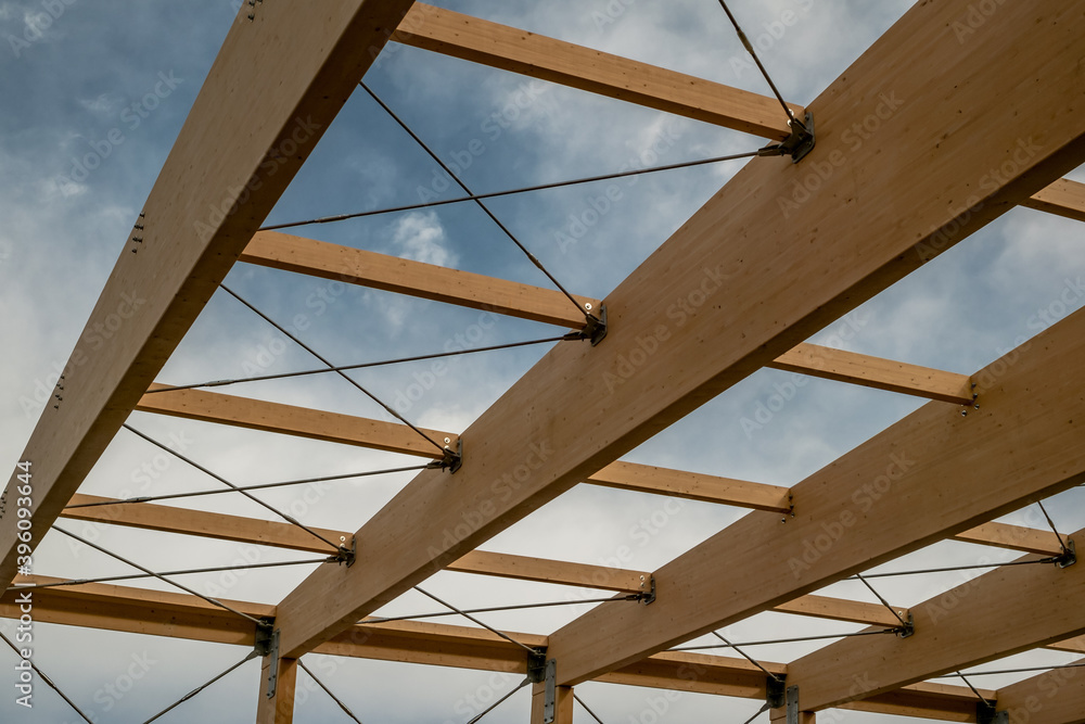 Detail of a modern wooden architecture in glued laminated timber on a ...