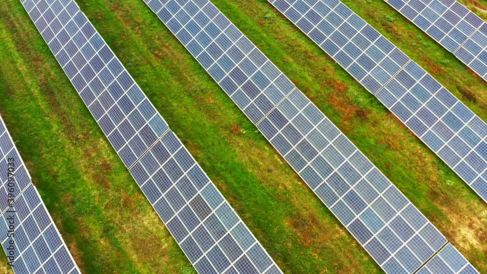 Power plant using renewable solar energy. Aerial UHD 4K drone realtime ...