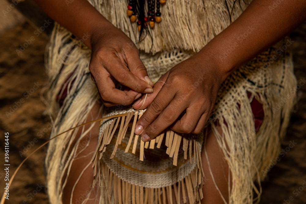 Hands of indigenous woman from the Huitoto tribe of the Colombian ...