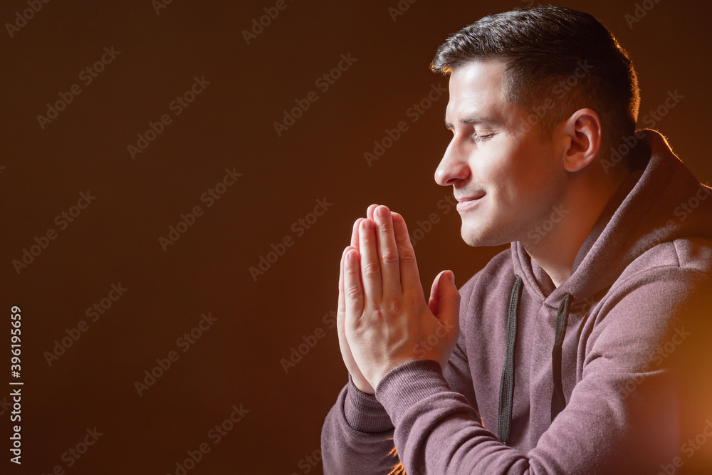 Relief from prayer. Communion with God. A guy with his eyes closed and ...