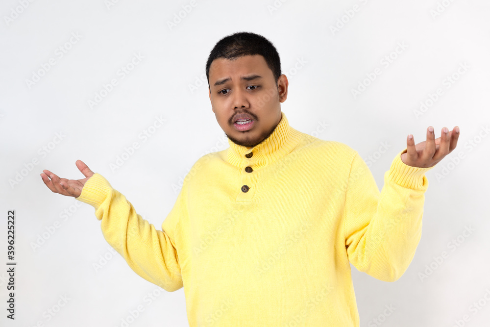 A picture of an embarrassed and embarrassed Asian man saying sorry ...