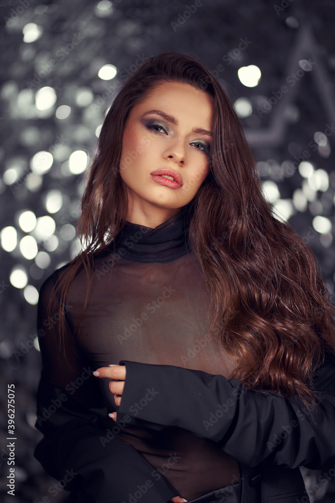 Sexy woman in black net body and blazer with perfect makeup and wavy ...