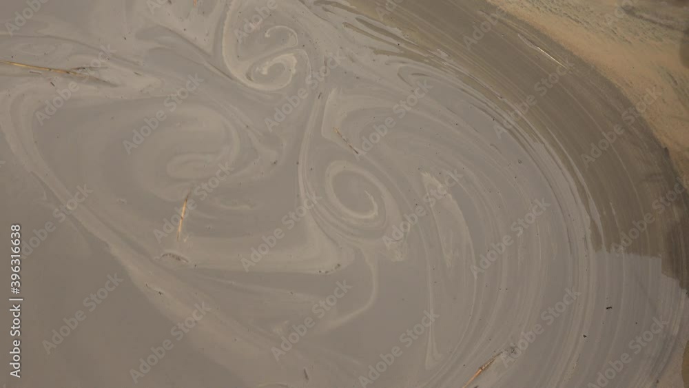 Dense, fluid, heavy and thick muddy water. Mud is soil, loam, silt or ...