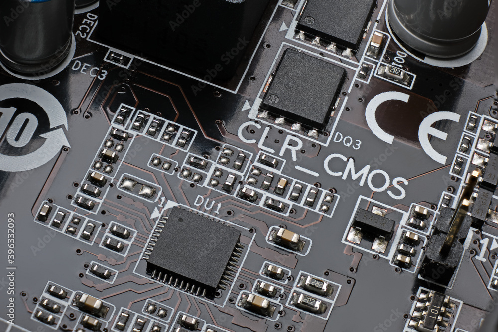Smd chip pwm microcontroller on brown motherboard with a lot of surface ...
