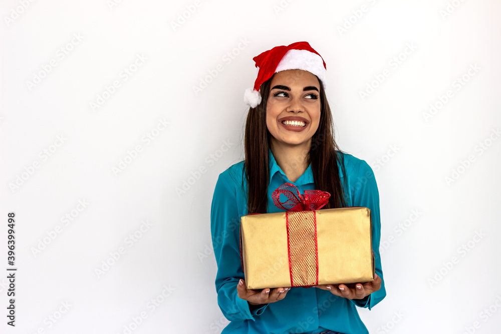 appy woman holding a gift box isolated on white background. Portrait of ...