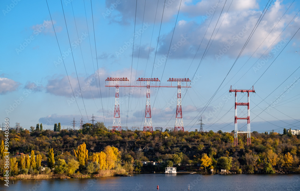 high voltage pillar, overhead power line, industrial background. power ...