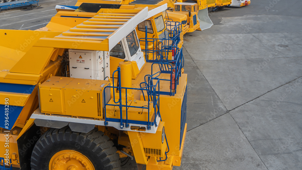 Heavy mining dump trucks are at the factory. Giant mining truck after ...