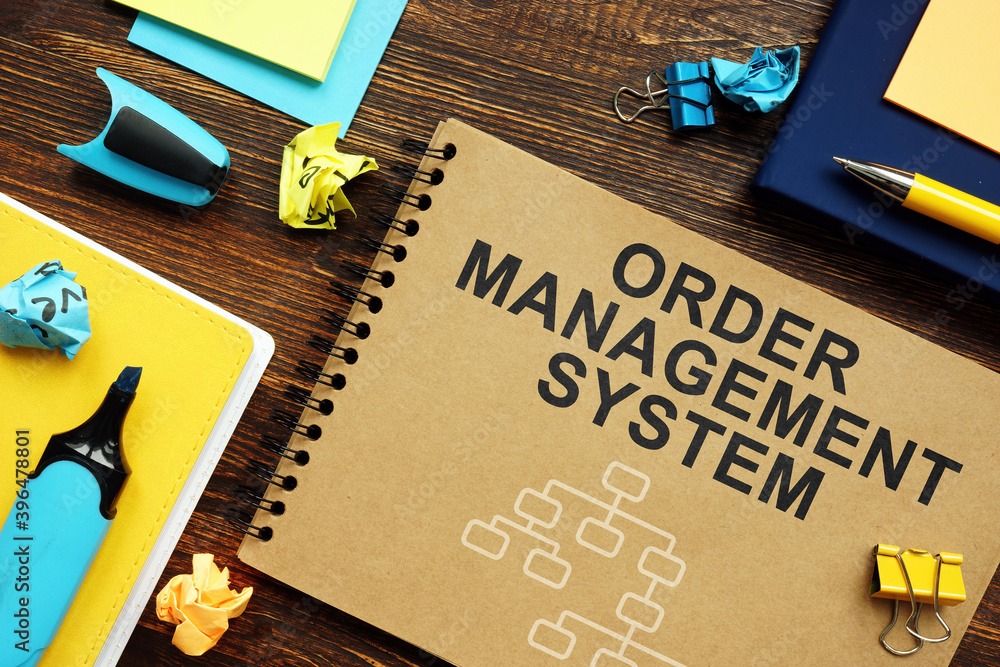 Order Management System OMS papers with charts on the desk. Stock Photo ...