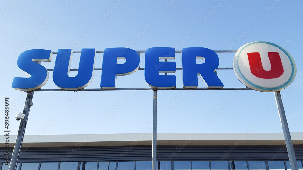 Super U supermarket sign text and logo store on market shop building ...